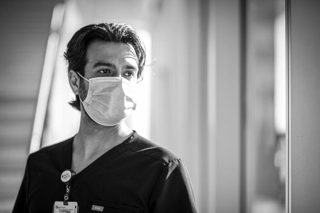 On the front lines for months, a critical care unit physician focuses ...